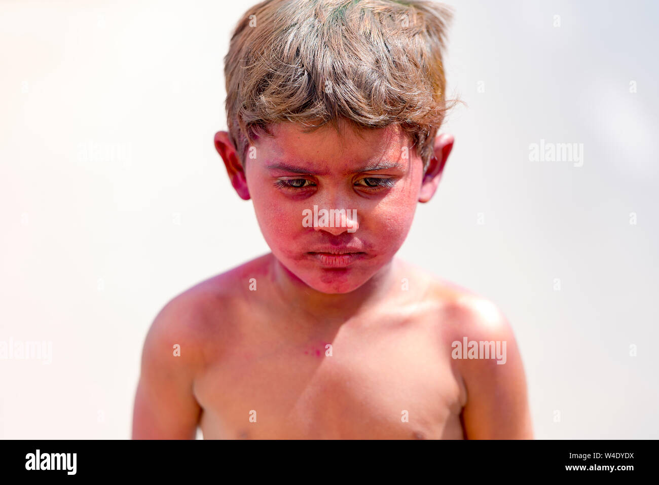 NEW DELHI - MAR 02: Indian street poor boy in New Delhi on March 02 ...