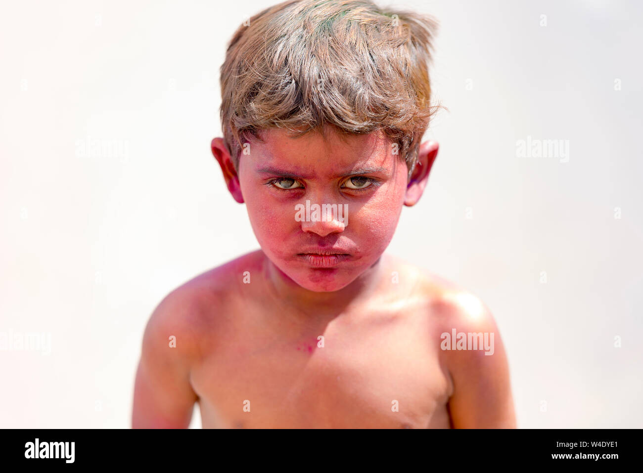 NEW DELHI - MAR 02: Indian street poor boy in New Delhi on March 02 ...