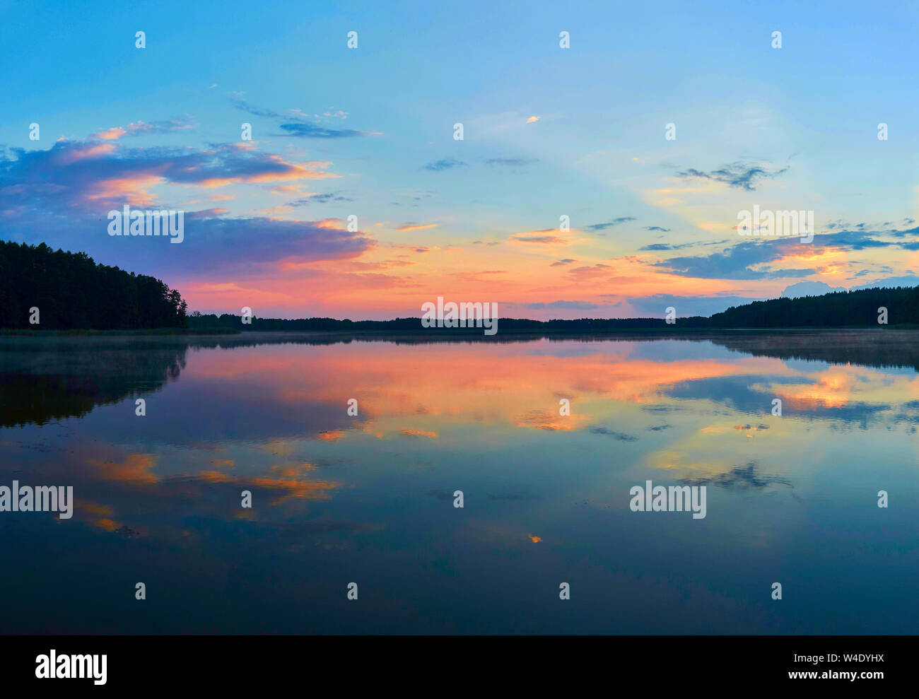Beautiful panoramic view of the sunset over Lemiet lake in Mazury lake ...