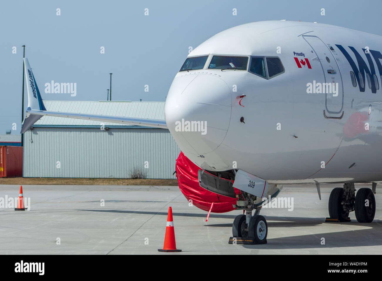 Grounded WestJet 737 MAX8 sits on the ramp at John C. Munro Hamilton ...