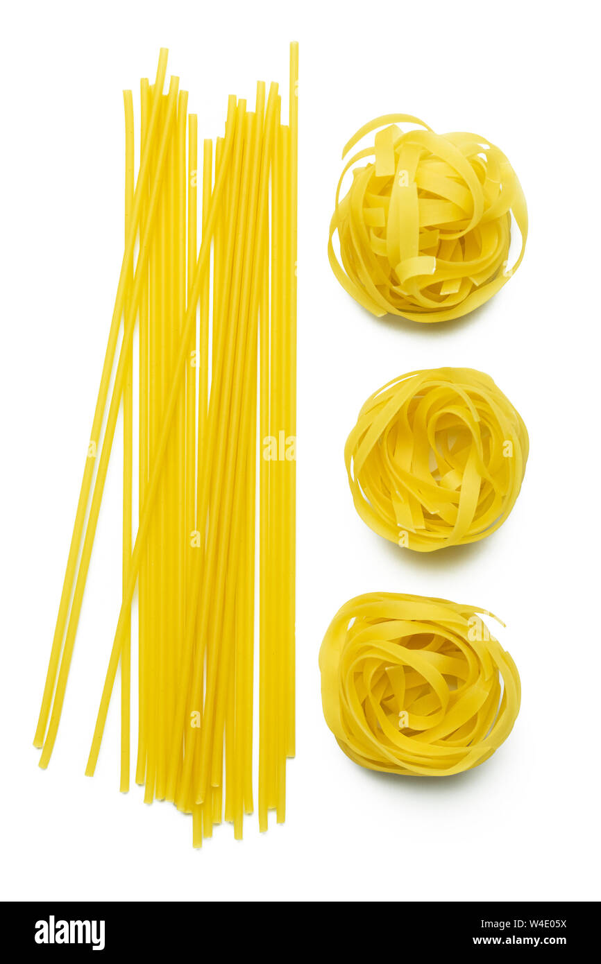 Raw tagliatelle pasta and spaghetti isolated on white background Stock ...