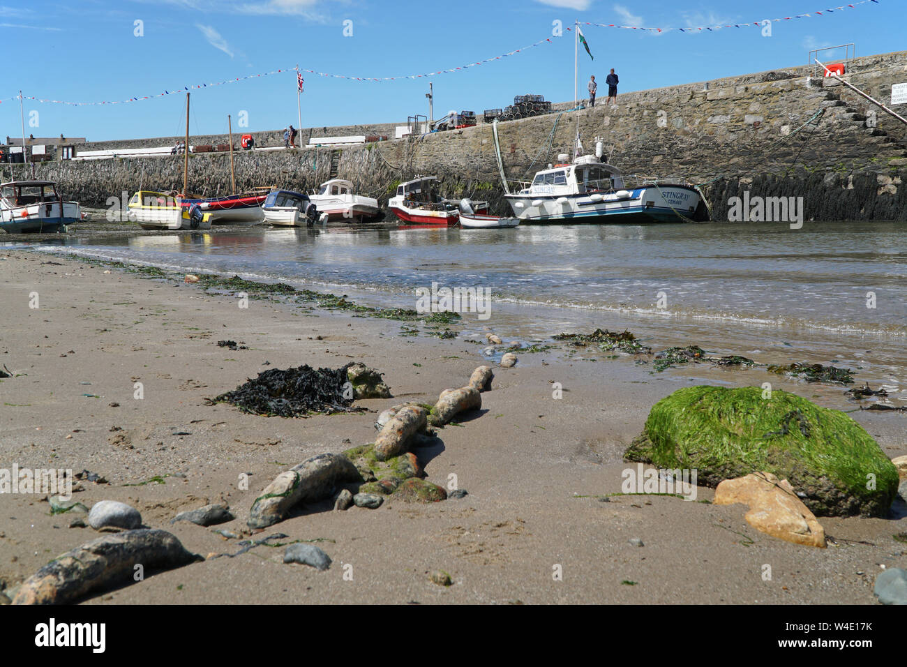 Small boats in the harbour at Cemaes Bay, Anglesey, North Wales, UK ...