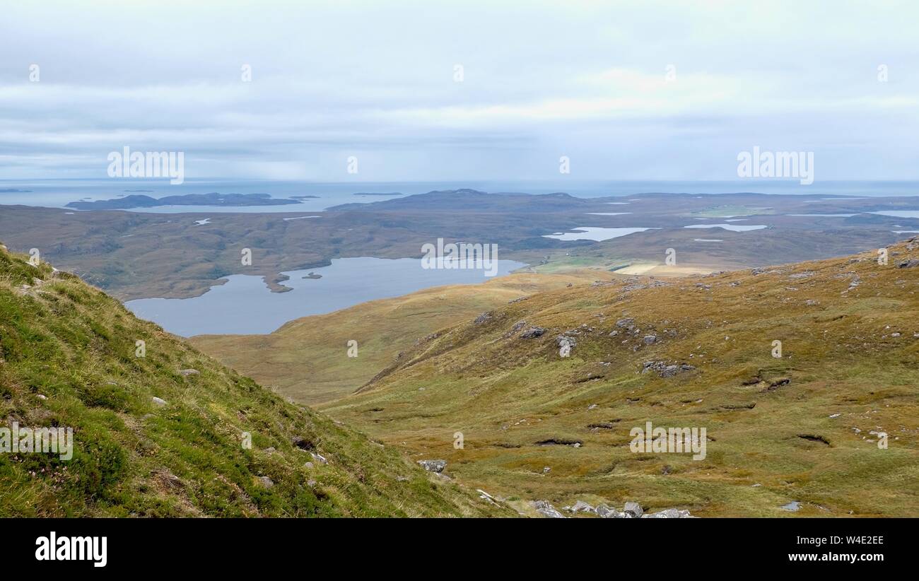 hiking trip around the Cul Mor in Lairg, Scotland - through meadows ...