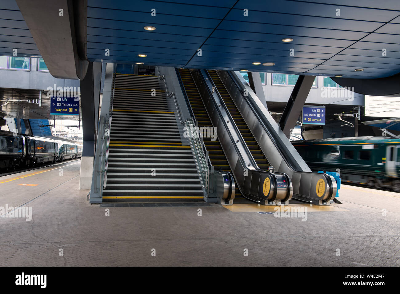 Platform exit stairs, train station Stock Photo - Alamy