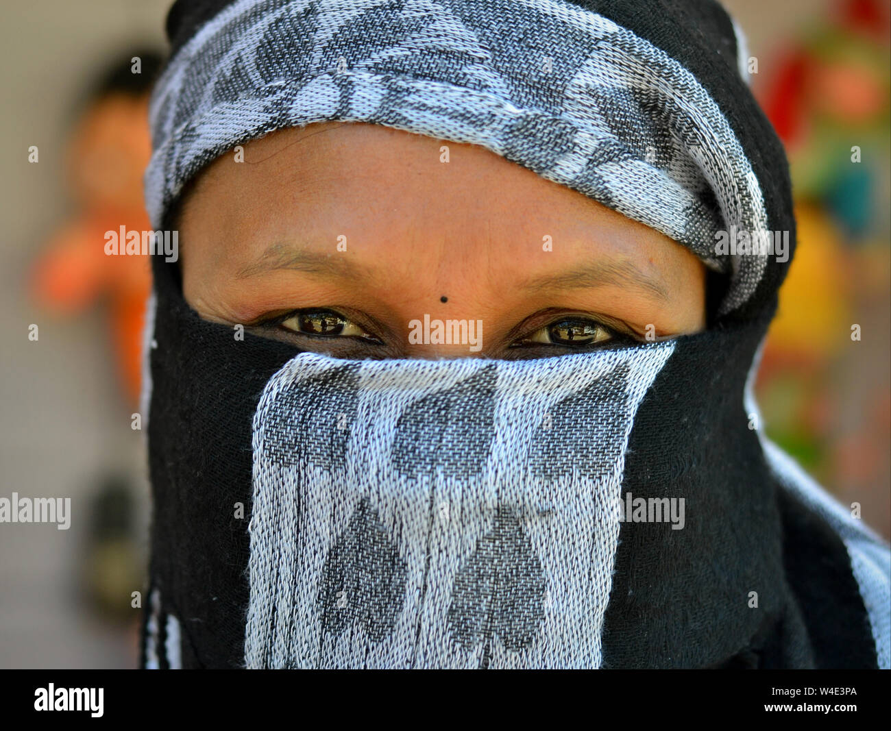 Woman covers eyes on street hi-res stock photography and images - Alamy