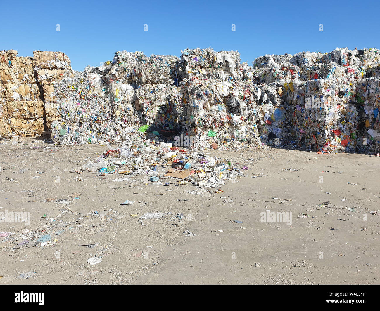 Stack of paper and cardboard garbage at recycling plan Stock Photo - Alamy