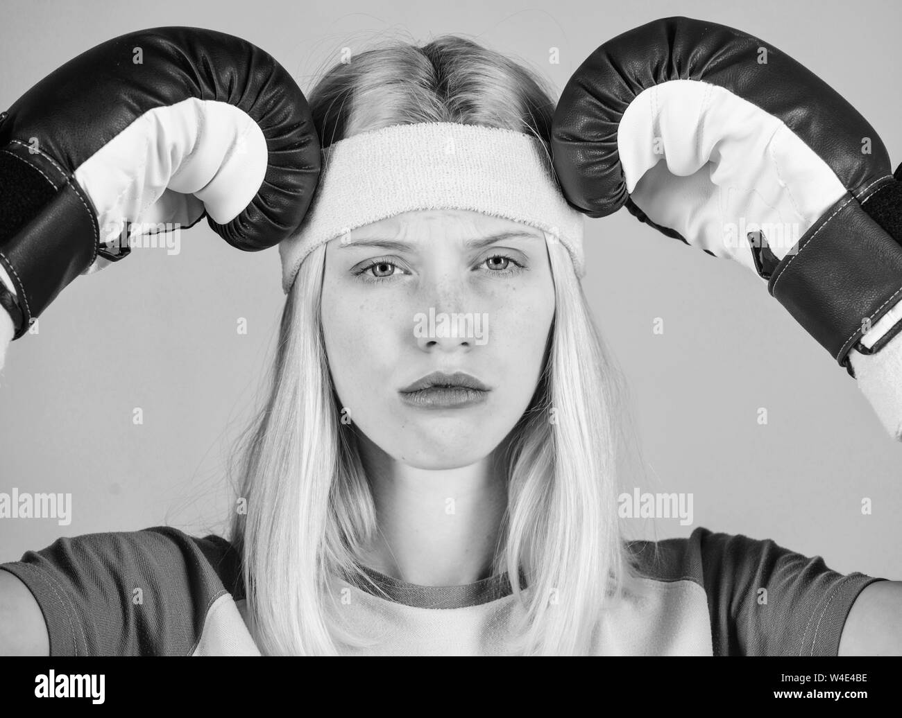 Strong woman suffer pain. Girl painful face embrace head with boxing ...