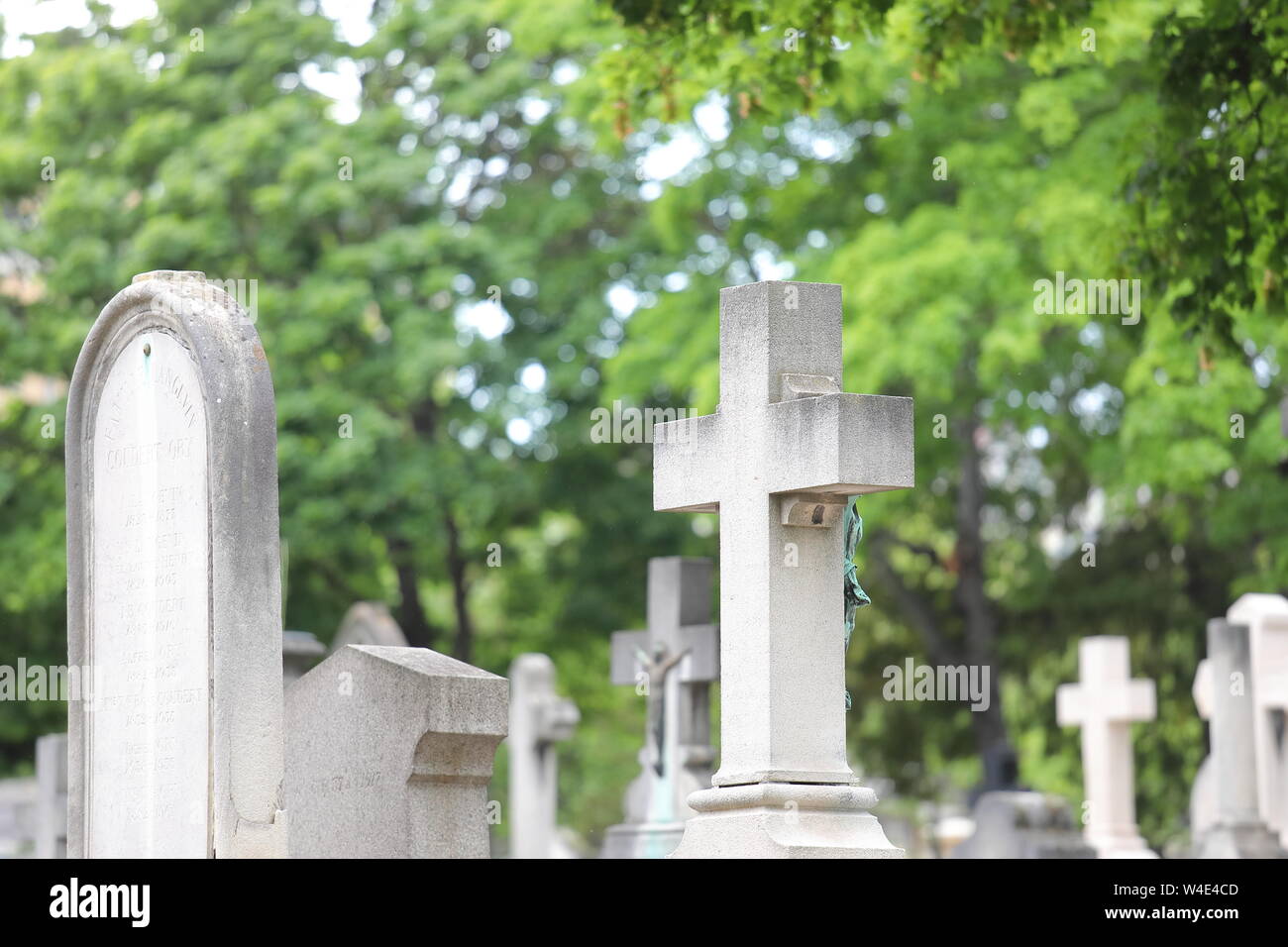 Stone cross cemetery graveyard background Stock Photo - Alamy