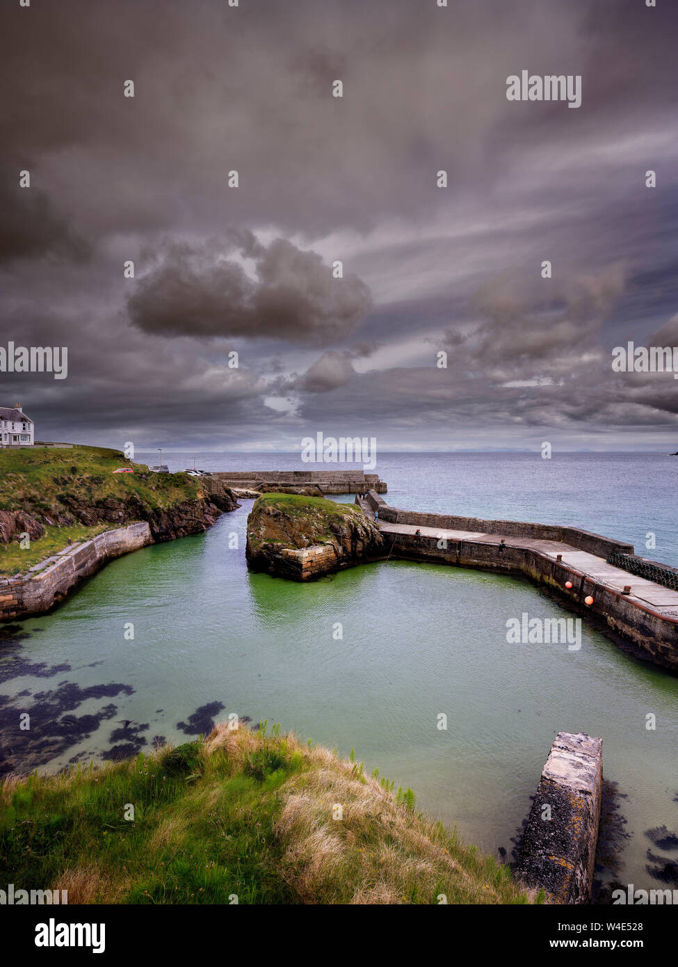 Looking down on the harbour at the Port of Ness on the northern tip of ...