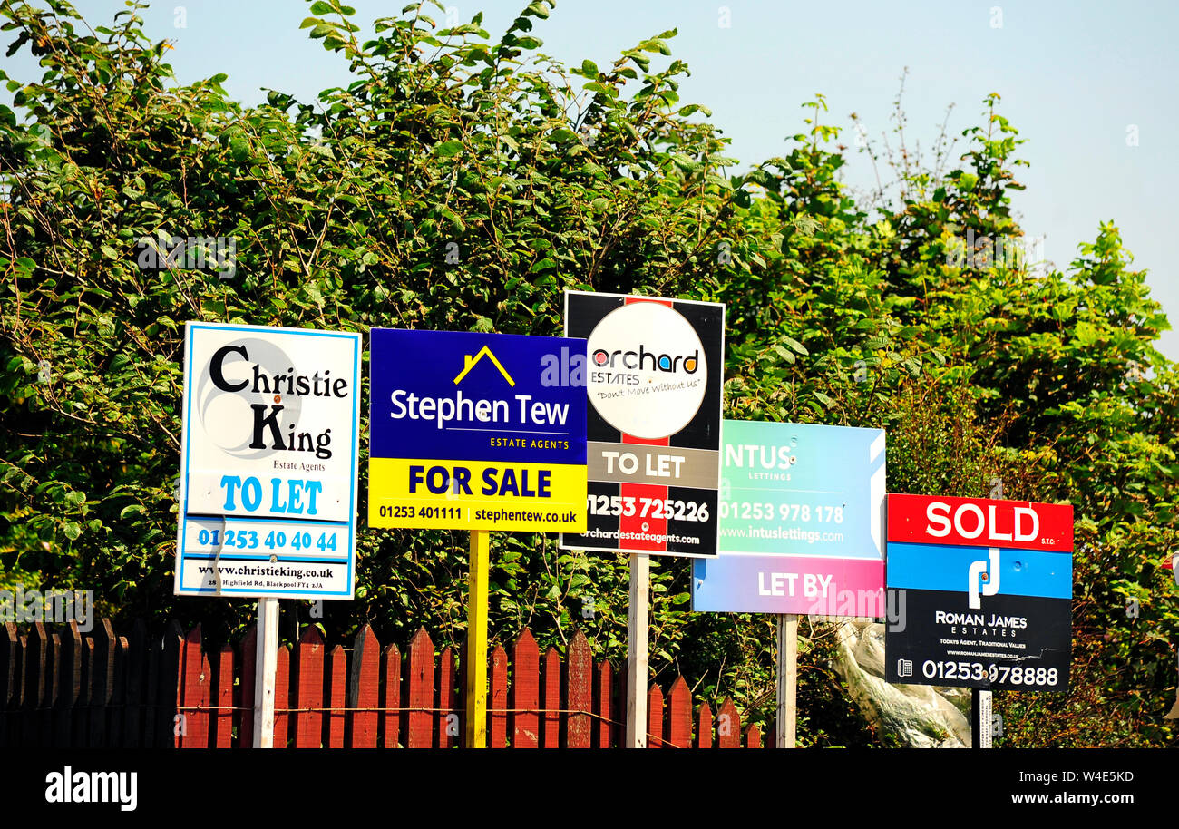 Row of sold signs hi-res stock photography and images - Alamy