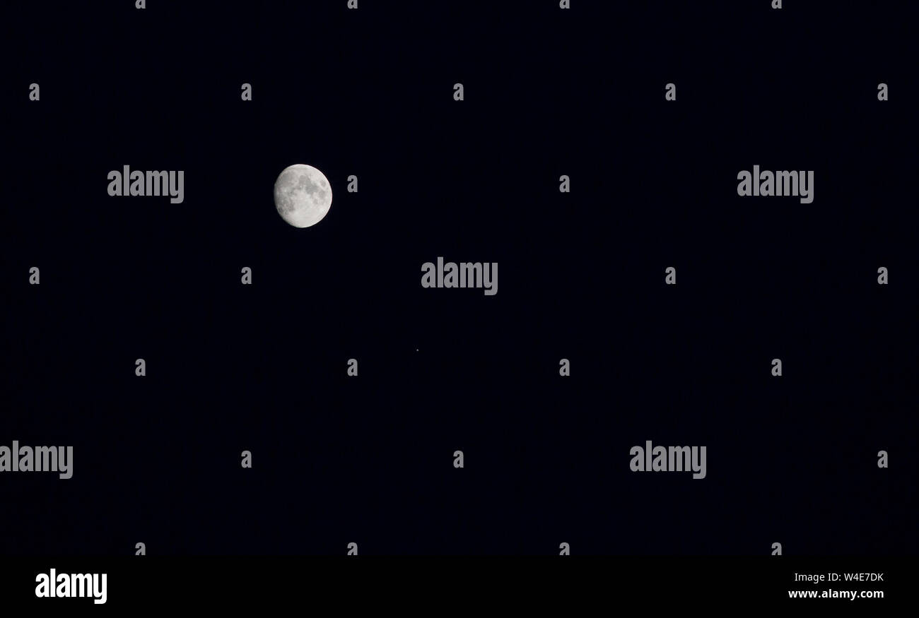 The moon and a planet in the night sky, UK Stock Photo - Alamy