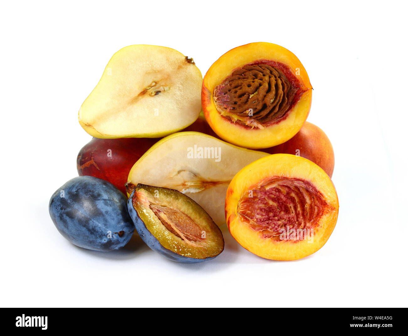 Mixed fruit cut into half isolated on white background Stock Photo - Alamy