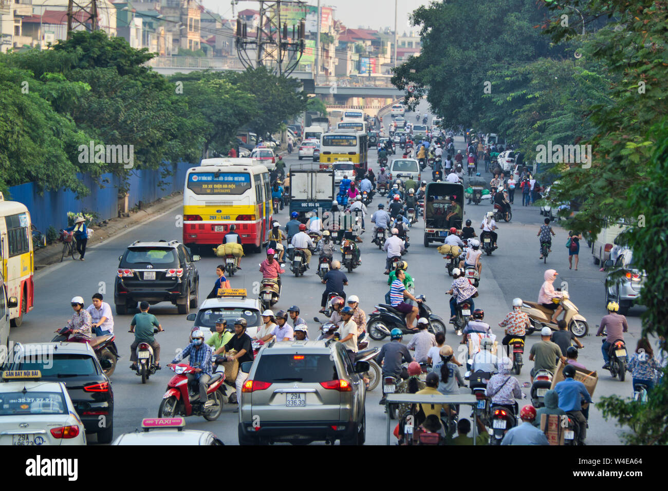 Busy street of vietnam. Typical day on a street of Hanoi Stock Photo ...