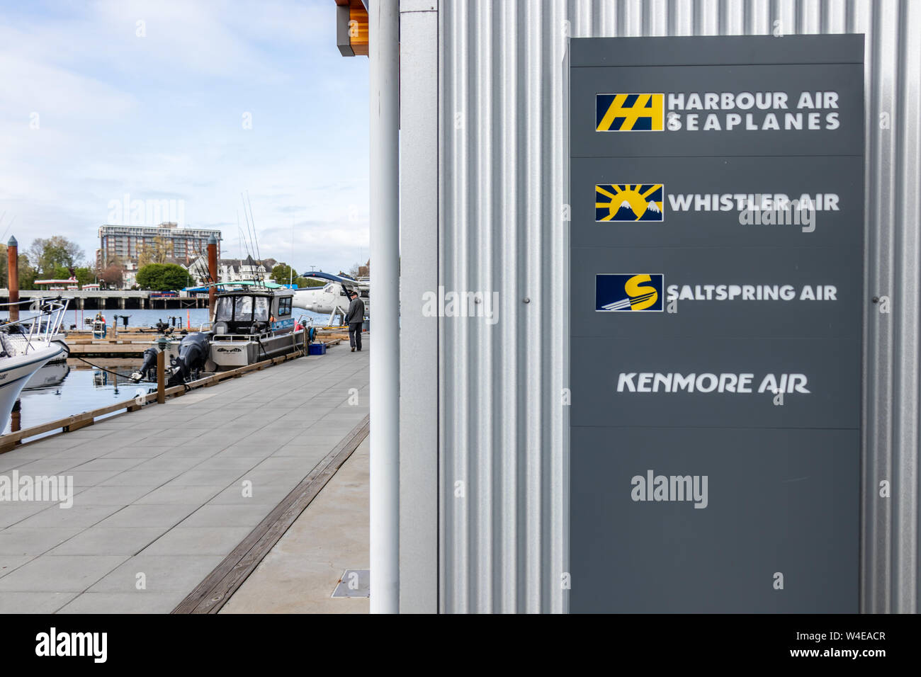 Sign on terminal building with list of the airlines operating out of ...