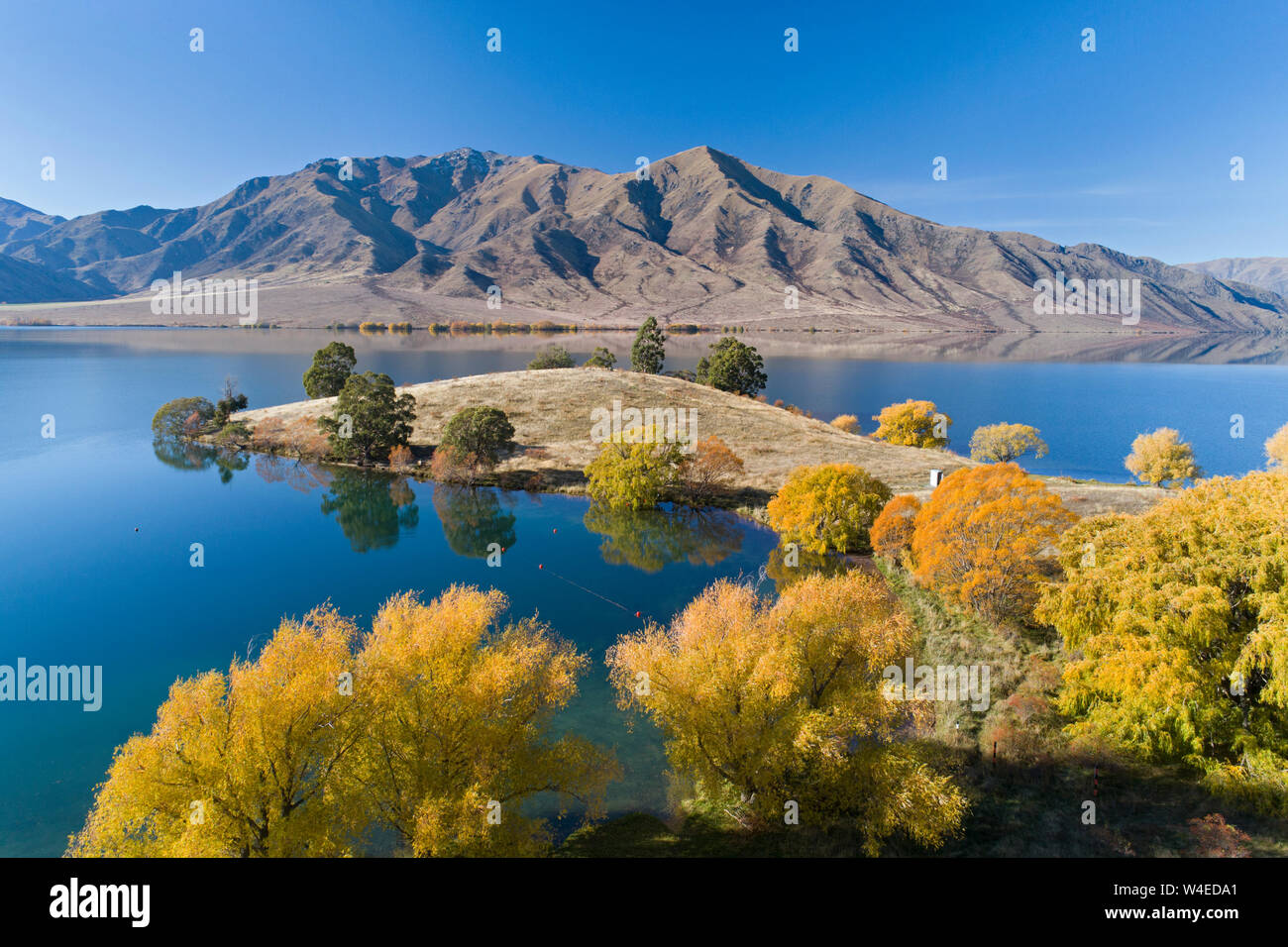 Lake Benmore, and autumn colours beside Alps 2 Ocean Cycle Trail ...