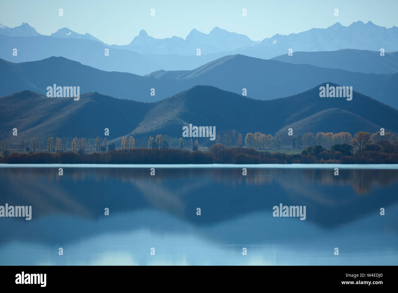 Mountains reflected in Lake Benmore, Waitaki Valley, North Otago, South ...