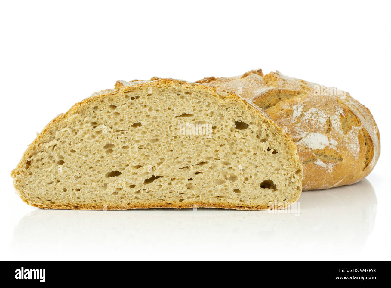 Group of one whole one half of fresh baked rye wheat bread cross ...