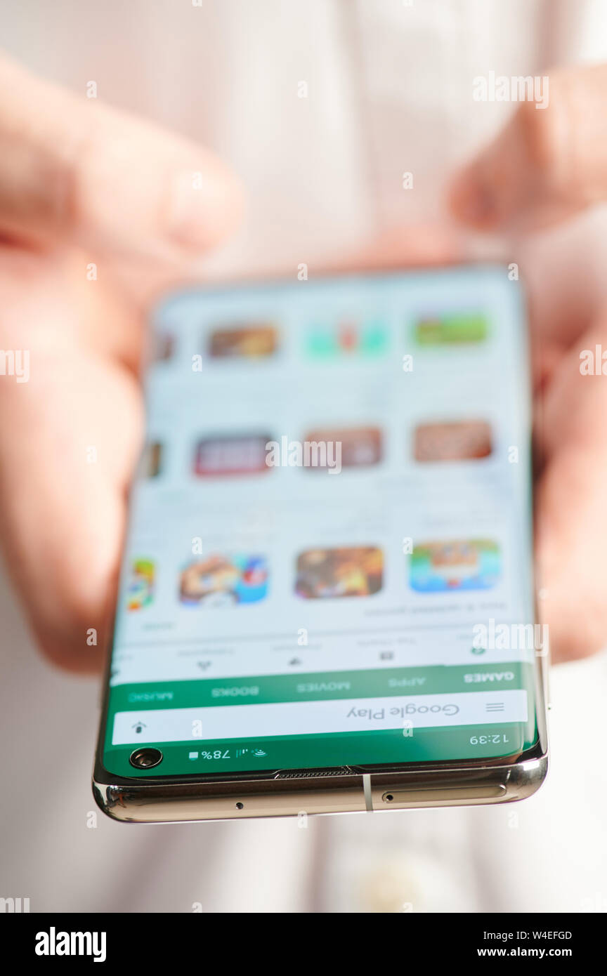 New york, USA - july 22, 2019: Using google play mobile app close up ...