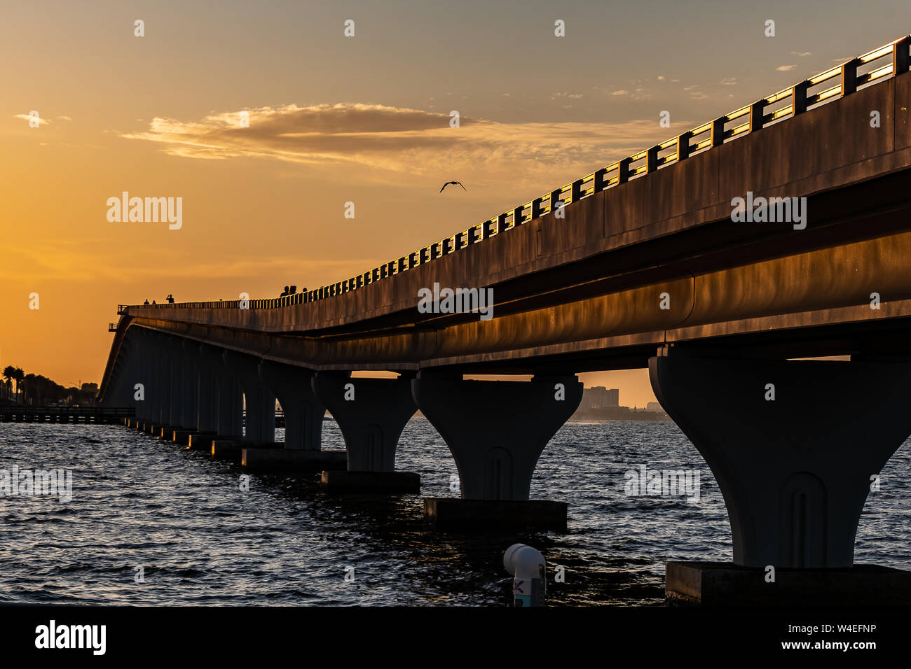 Sun reflecting off the walking bridge in Florida USA Stock Photo - Alamy