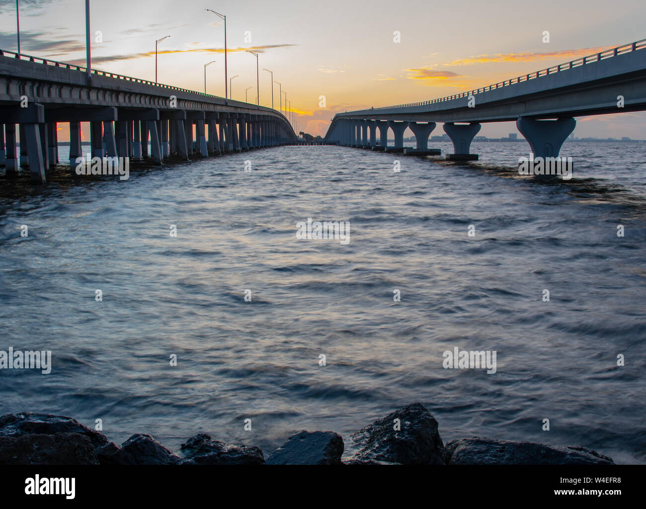Wide angle view between two bridges at dawn Stock Photo - Alamy