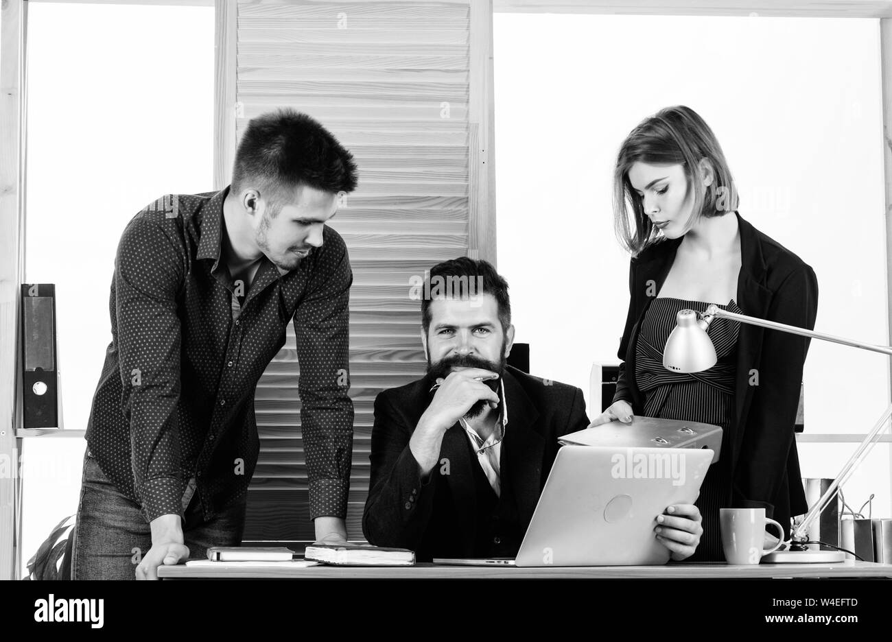 Group project on desk Black and White Stock Photos & Images - Alamy