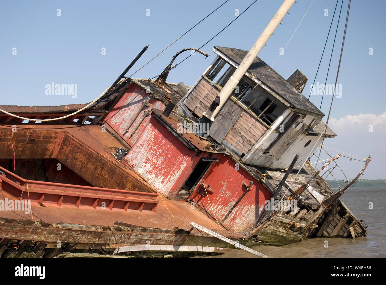Shipwreck on a Beach in Baie St-Paul Quebec, Canada with Blue Sky Stock ...