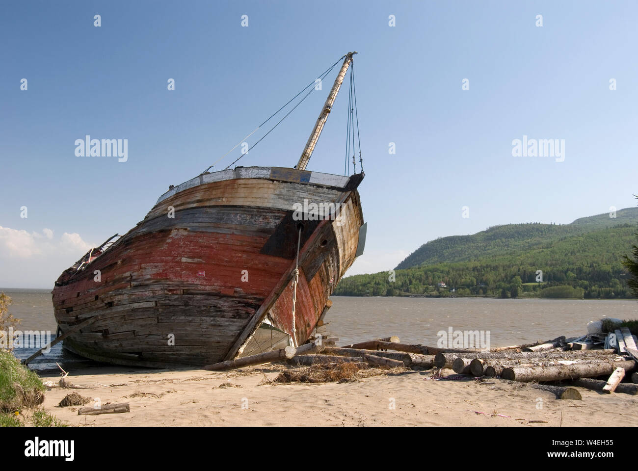 Shipwreck on a Beach in Baie St-Paul Quebec, Canada with Blue Sky Stock ...