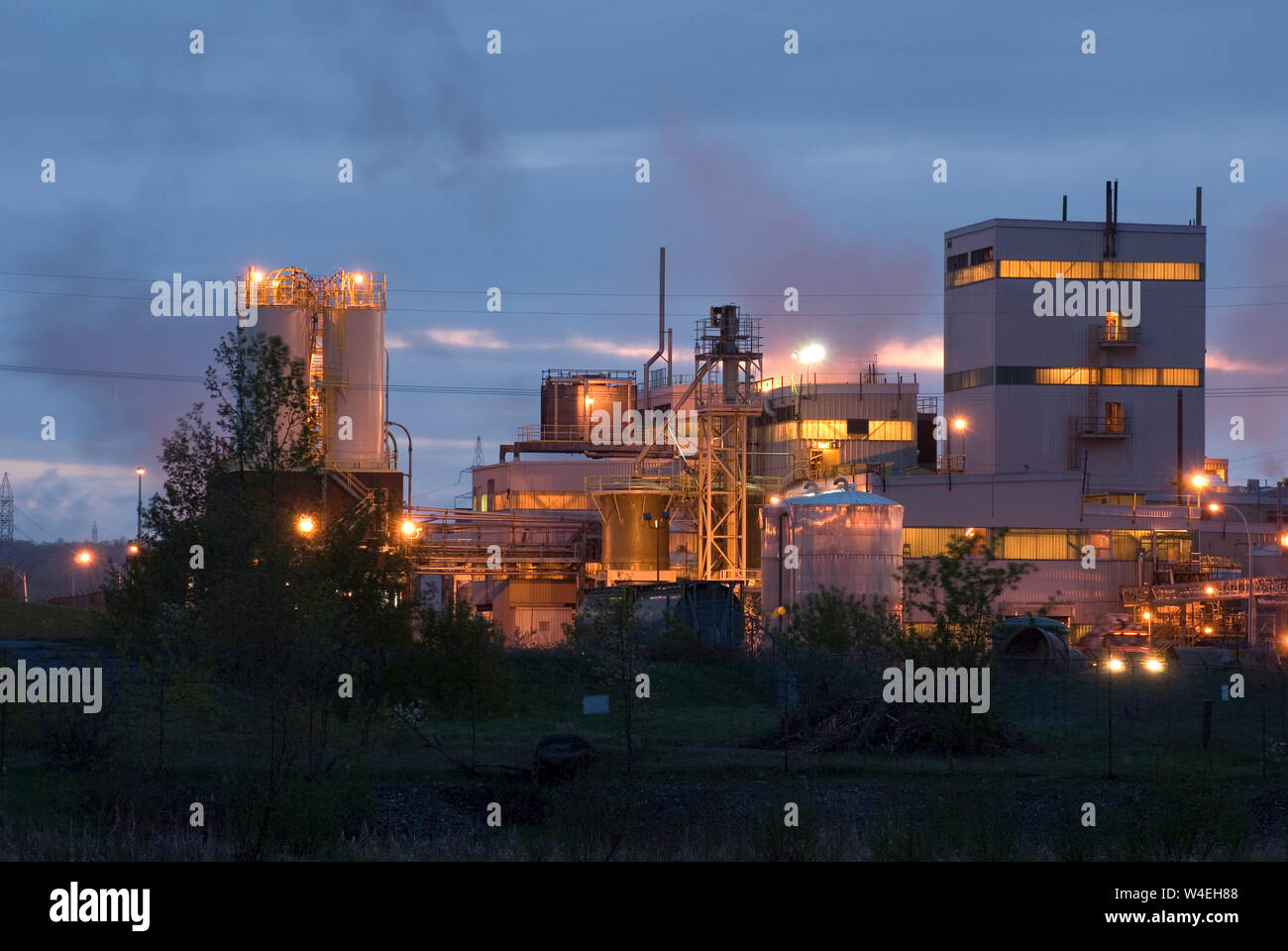 Industrial Exterior Buildings at Night Stock Photo - Alamy