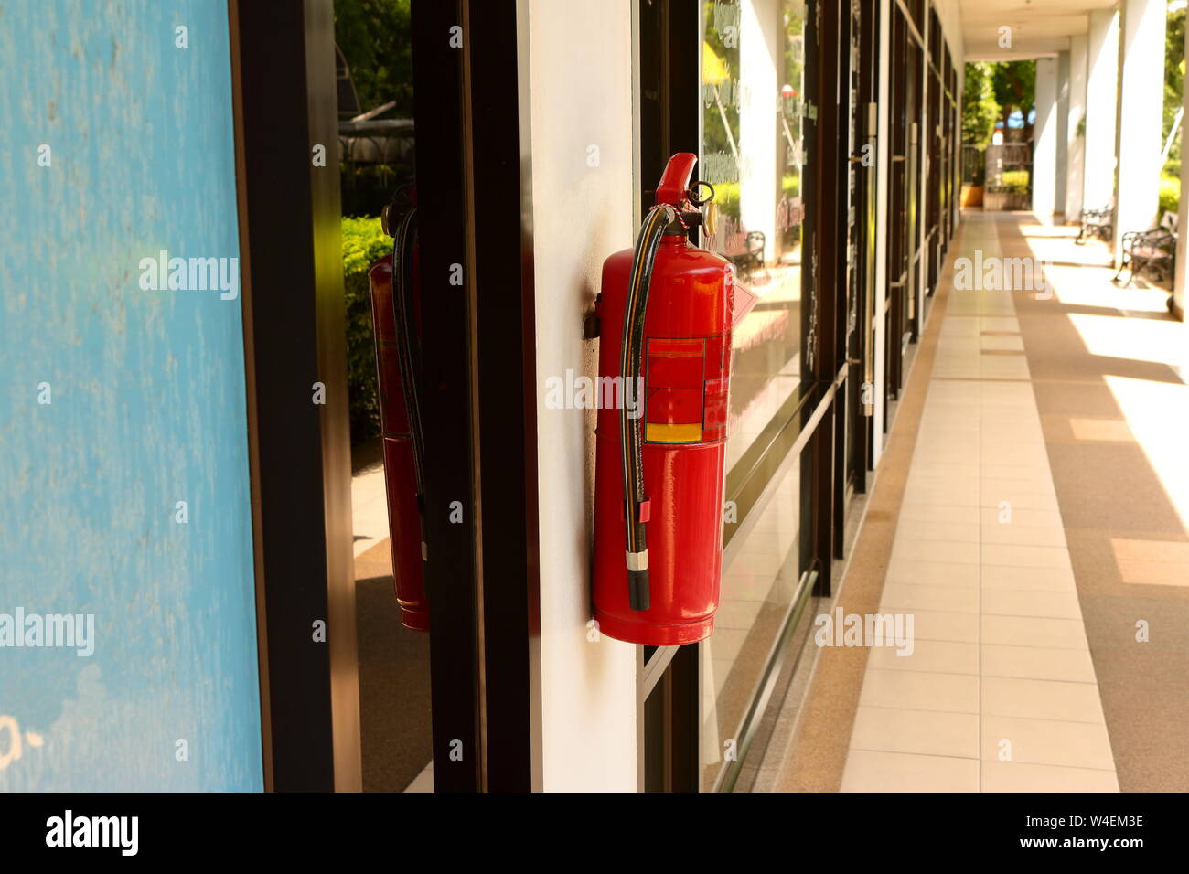Corridor fire extinguisher hi-res stock photography and images - Alamy
