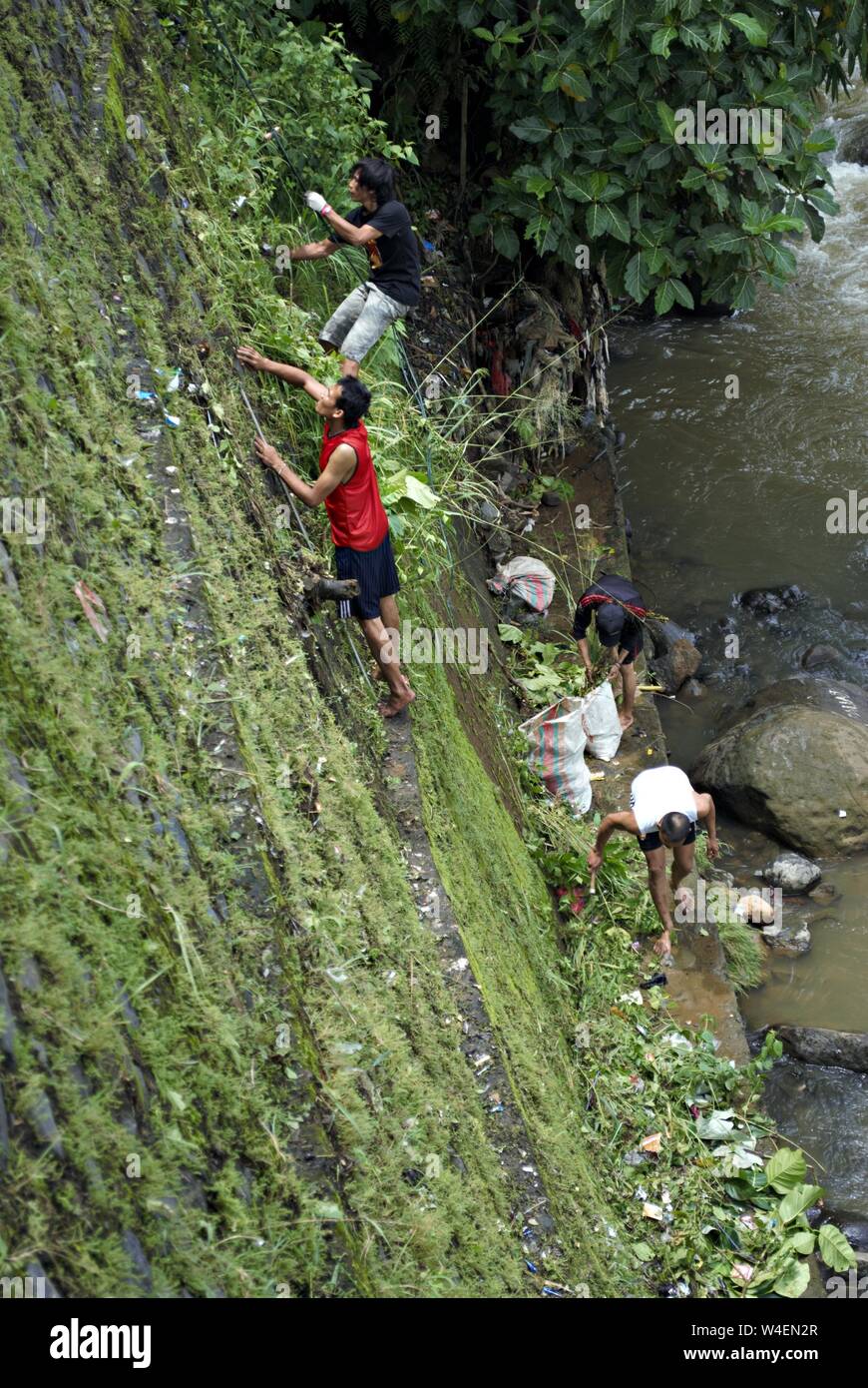 Bogor, West Java, Indonesia - July 2019 : A group of men work together ...