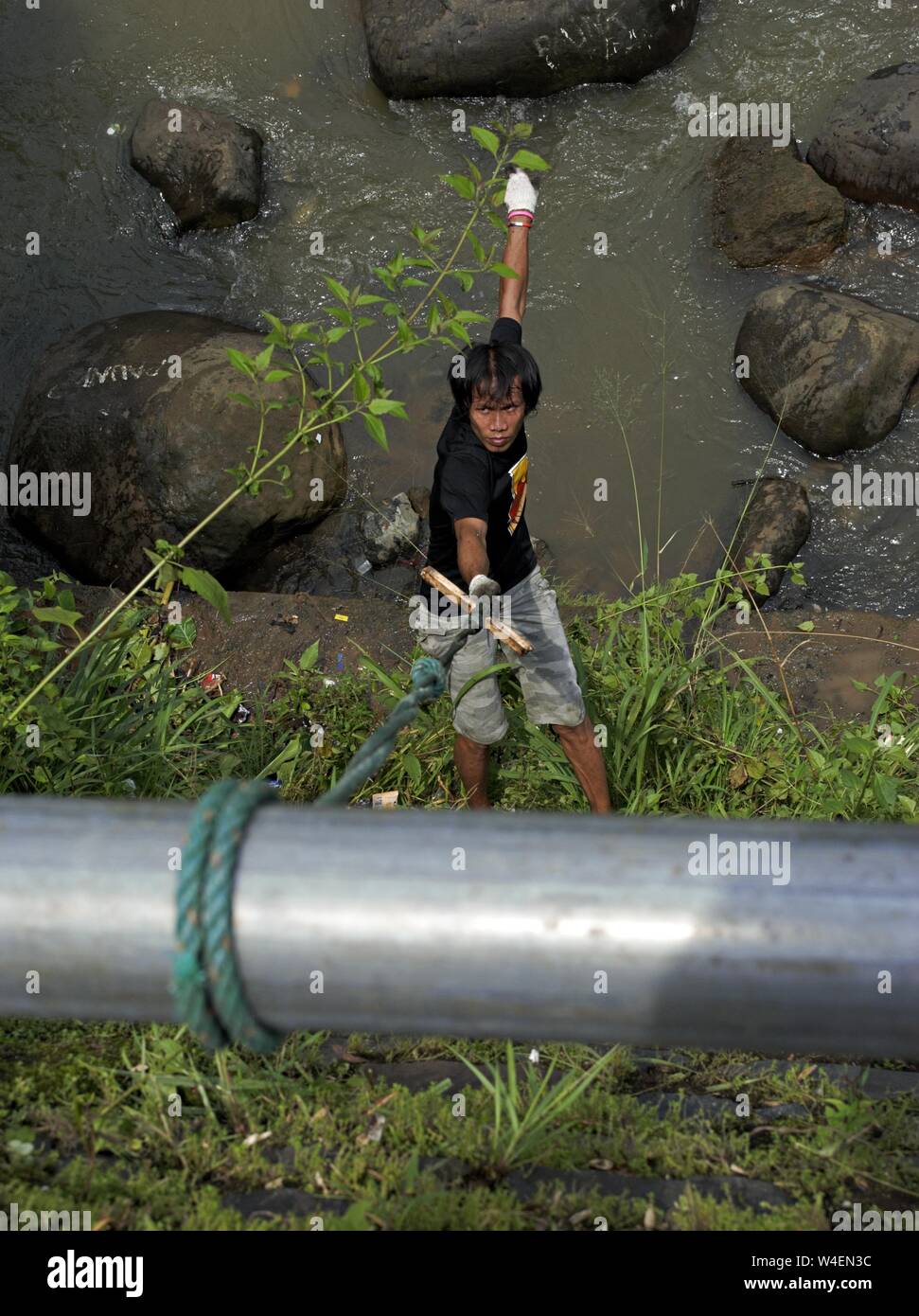 Bogor, West Java, Indonesia - July 2019 : A group of men work together ...