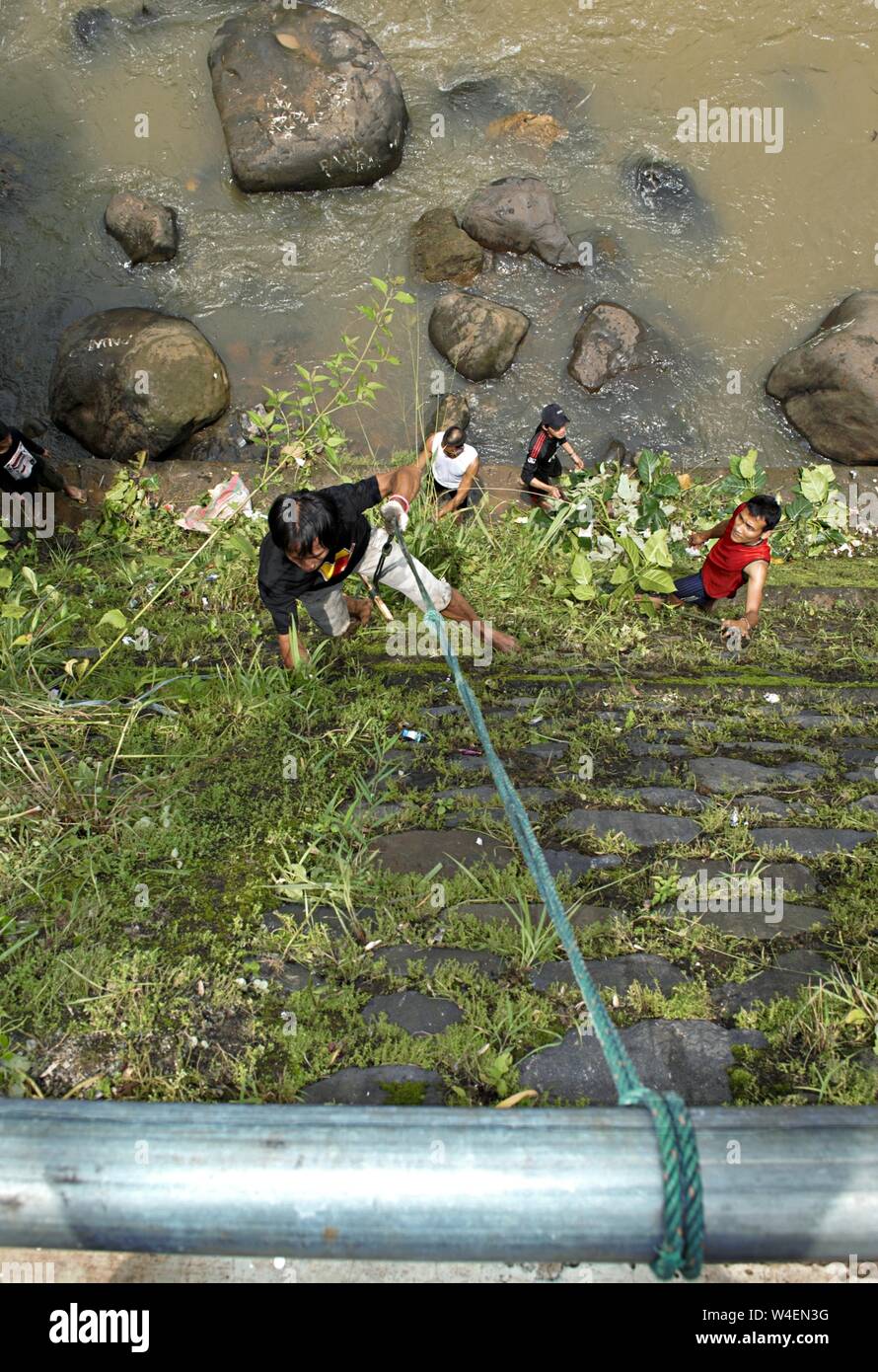 Bogor, West Java, Indonesia - July 2019 : A group of men work together ...