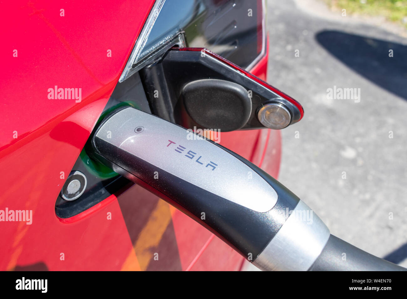 Tesla Supercharging cord handle seen while plugged into Tesla Model S ...