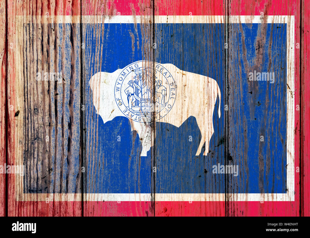 Wyoming US state national flag on a gray wooden boards background on ...