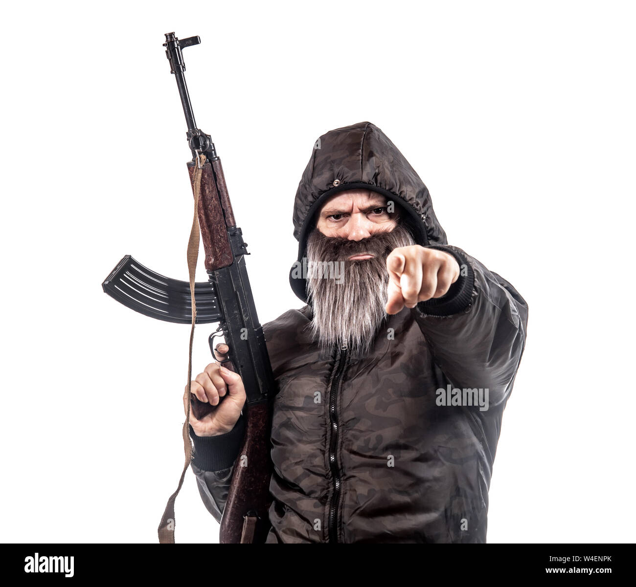 The bearded man armed with kalashnikov isolated on a white background ...