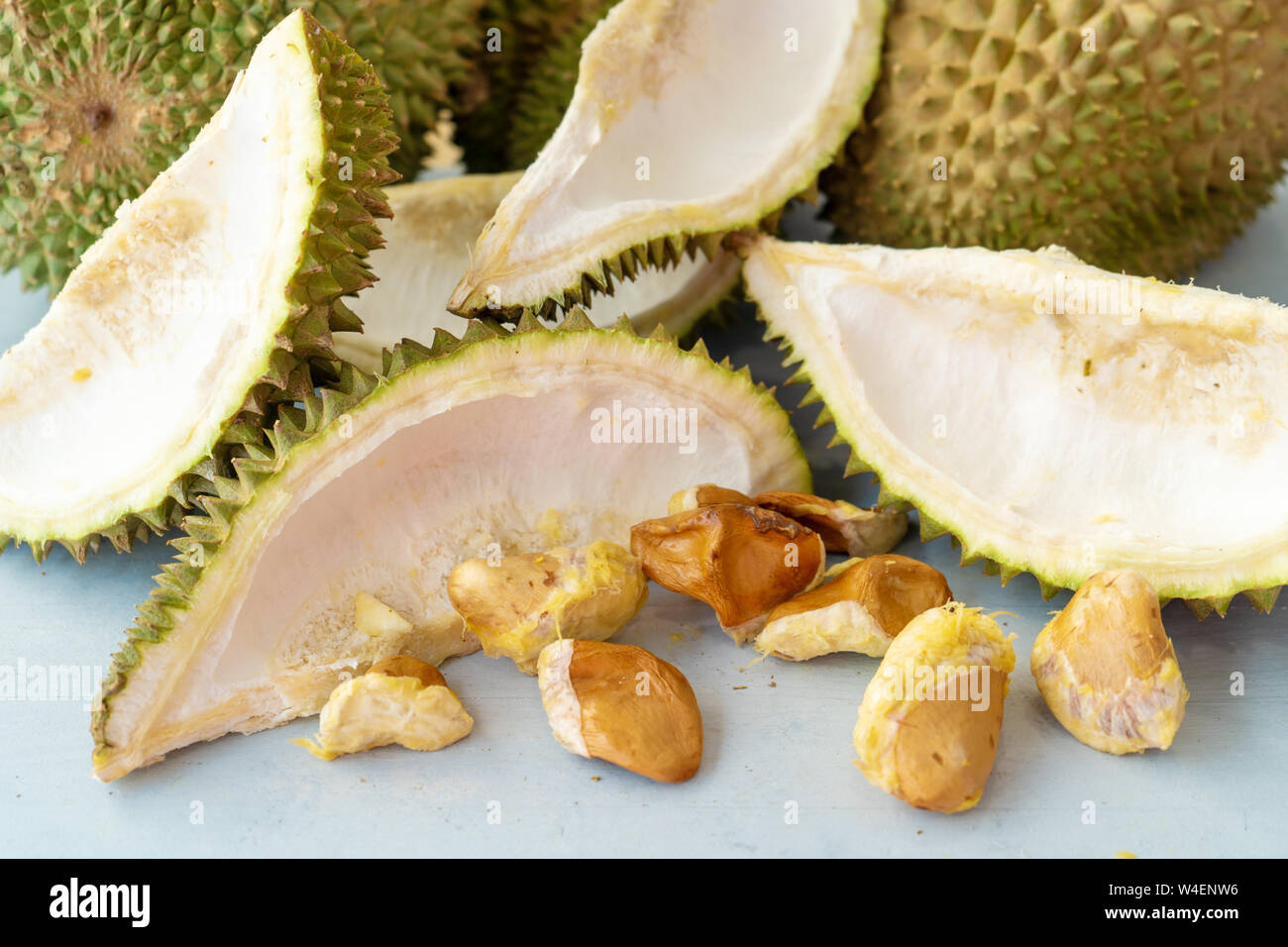 Leftover durian, shells and seeds on table Stock Photo - Alamy