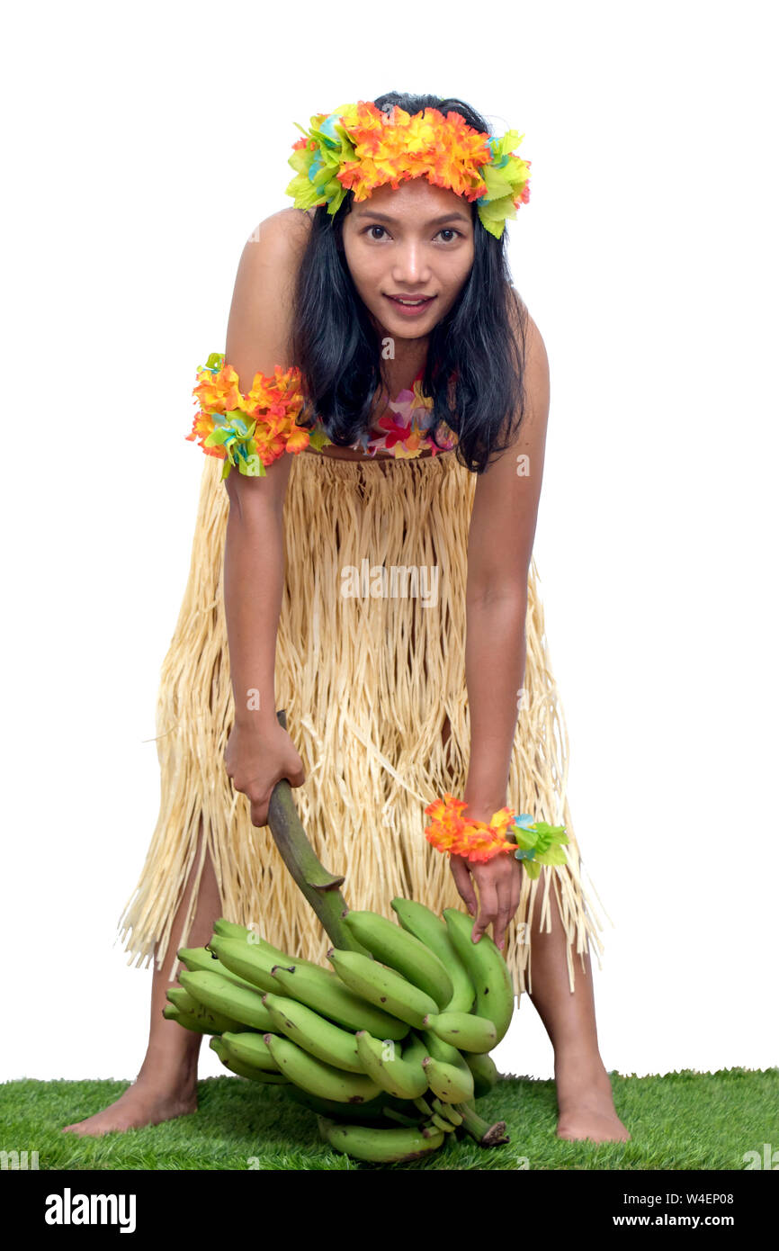 Hawaii Hula Dancer carries bunch of green bananas, isolated on white ...