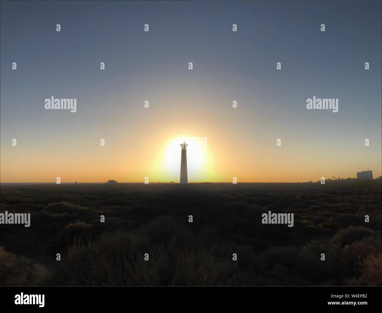 Morro Jable lighthouse at sunset on the beach in Fuerteventure Canary ...