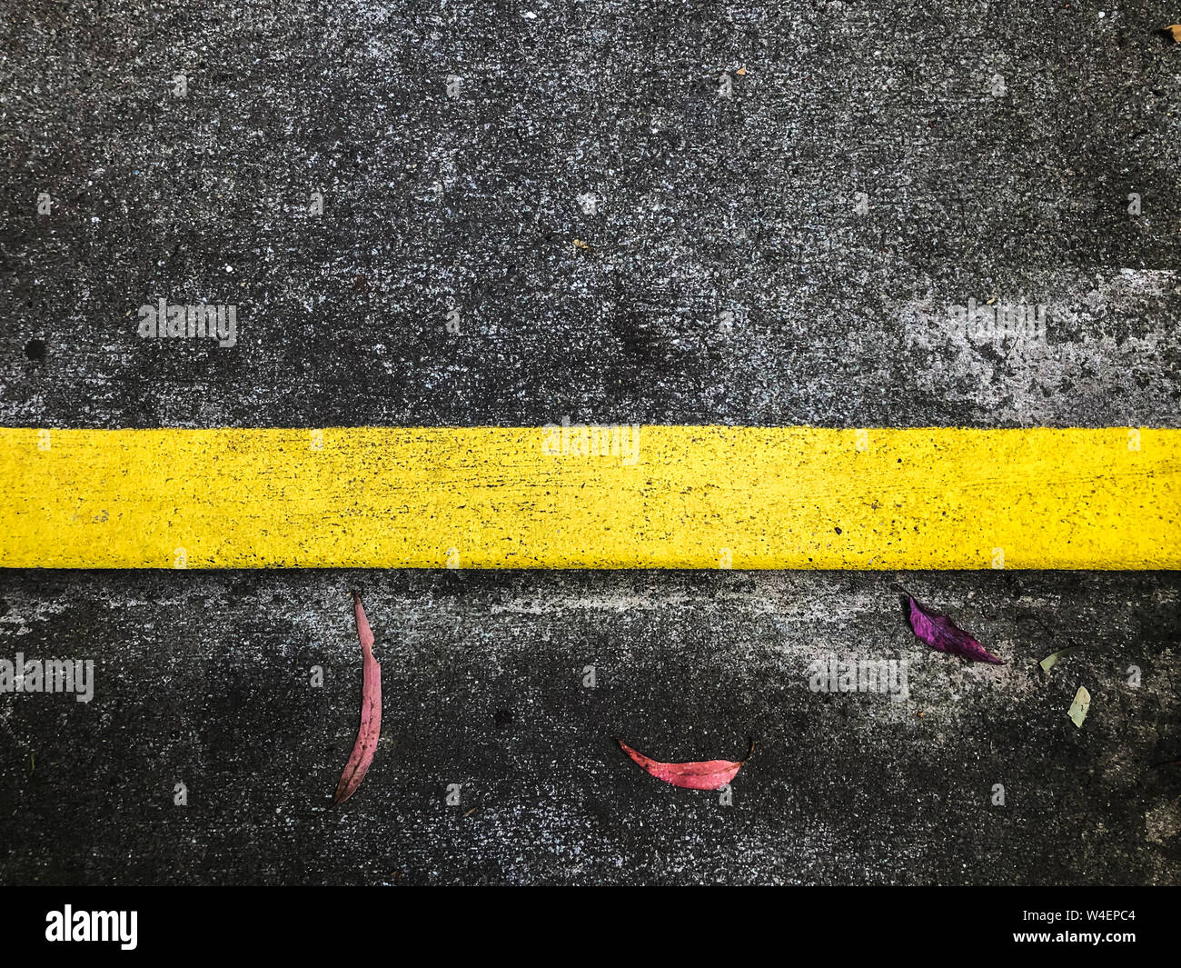 yellow line in concrete Stock Photo - Alamy