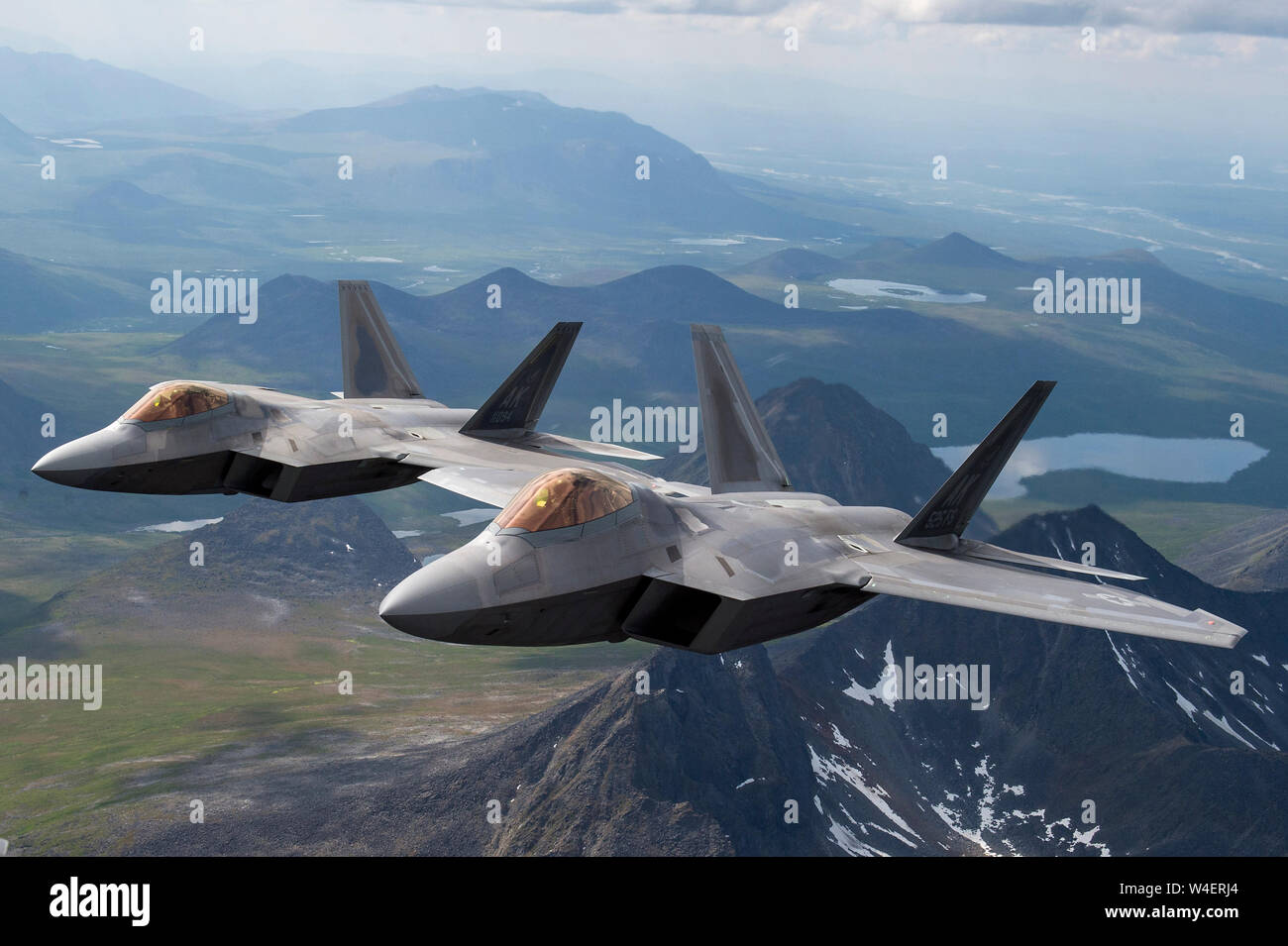 U.S. Air Force F-22 Raptors from Joint Base Elmendorf-Richardson, fly ...