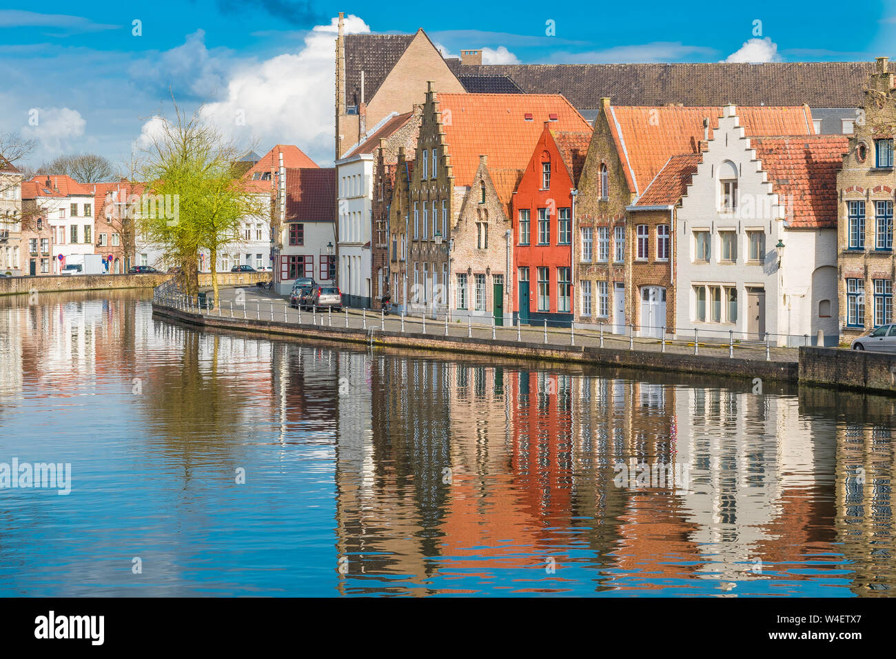 Medieval buildings along a canal in Bruges, Belgium Stock Photo - Alamy