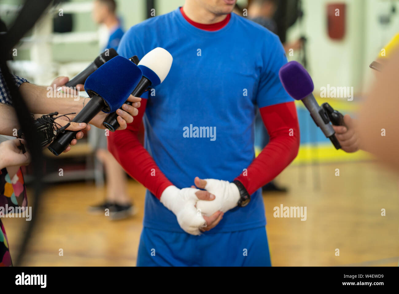 Boxing fighter giving an interview Stock Photo - Alamy