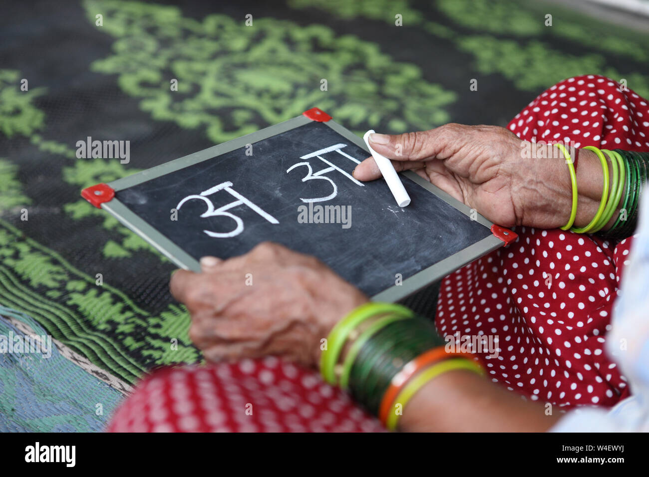 Indian mature students studying in a class Stock Photo - Alamy
