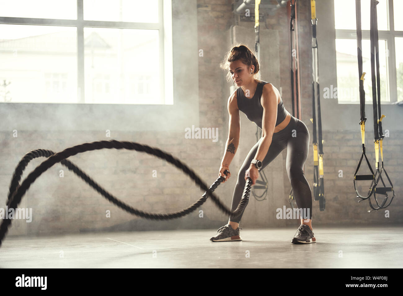 Preparing for the competition. Young athletic woman with perfect body ...