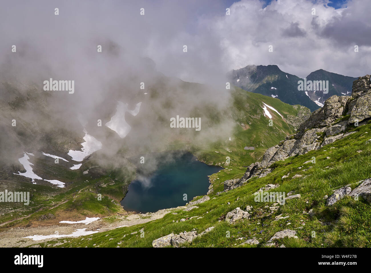Landscape from Capra Lake in Romania and Fagaras mountains in the ...