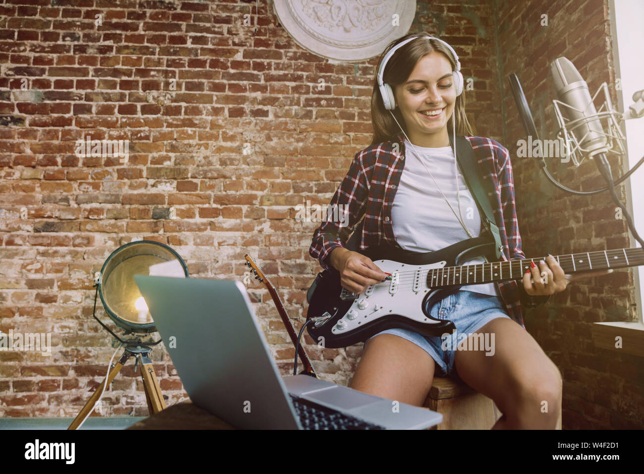 Female guitar recording studio hi-res stock photography and images - Alamy