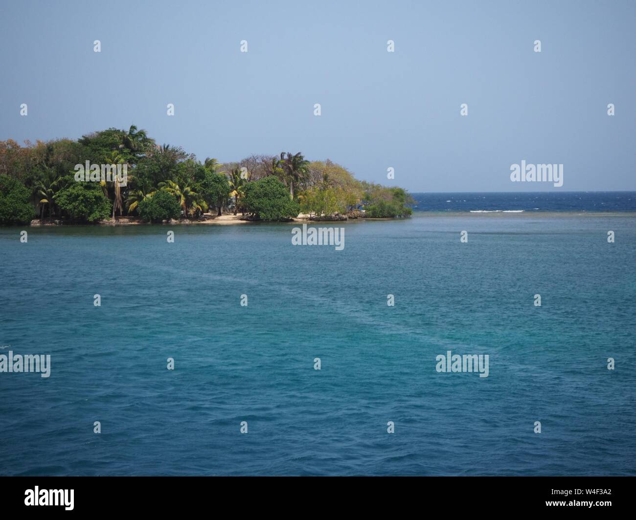 Ship wreck and island off of Roatan and Utila Bay Islands in the ...