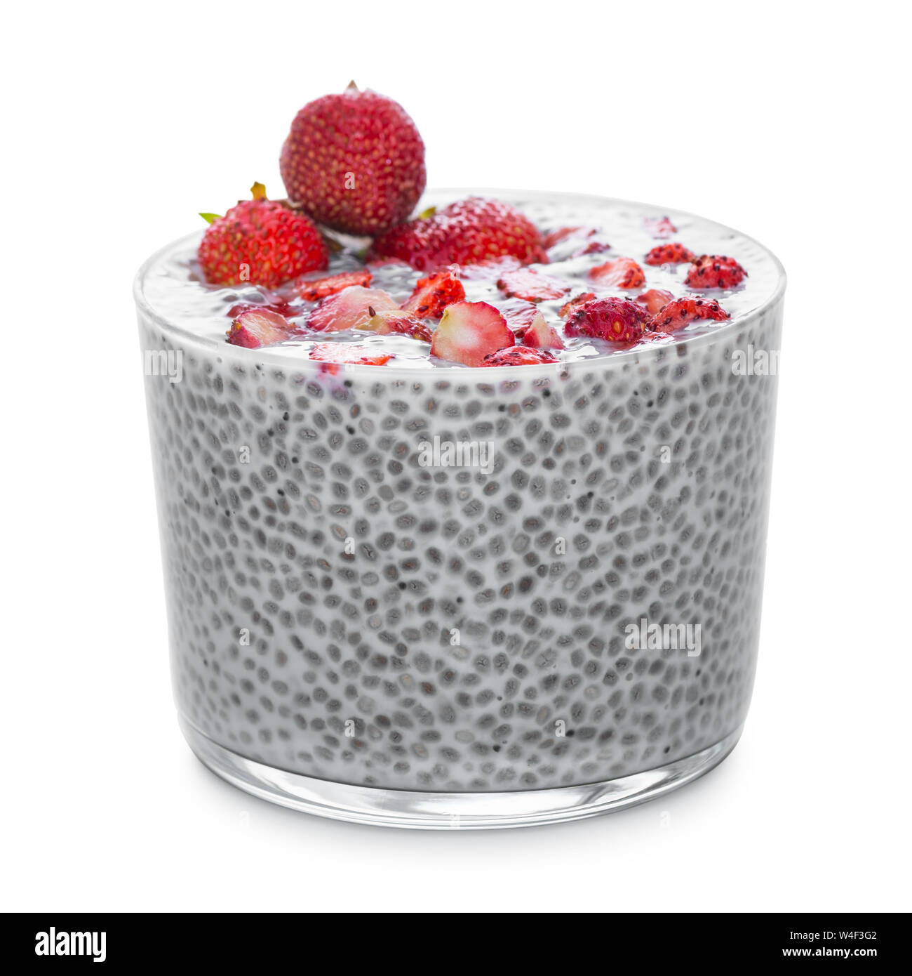 chia seeds pudding with strawberries in glass isolated on white ...