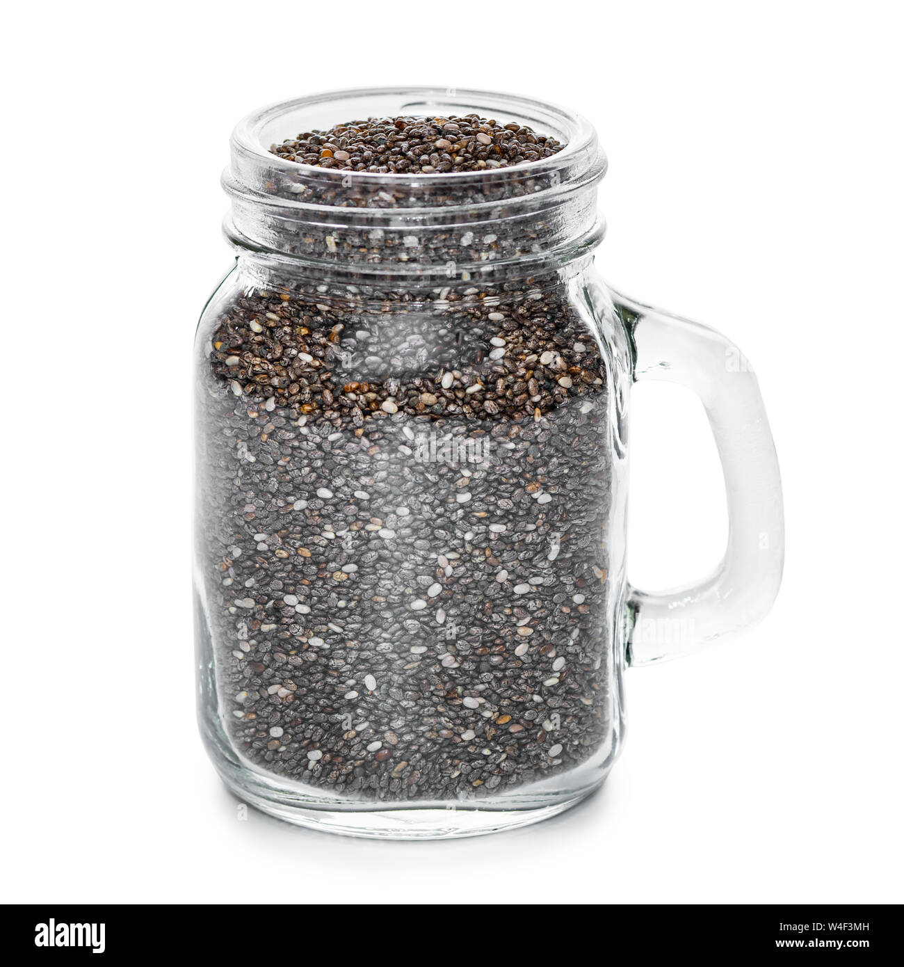 chia seeds in jar isolated on white background Stock Photo - Alamy