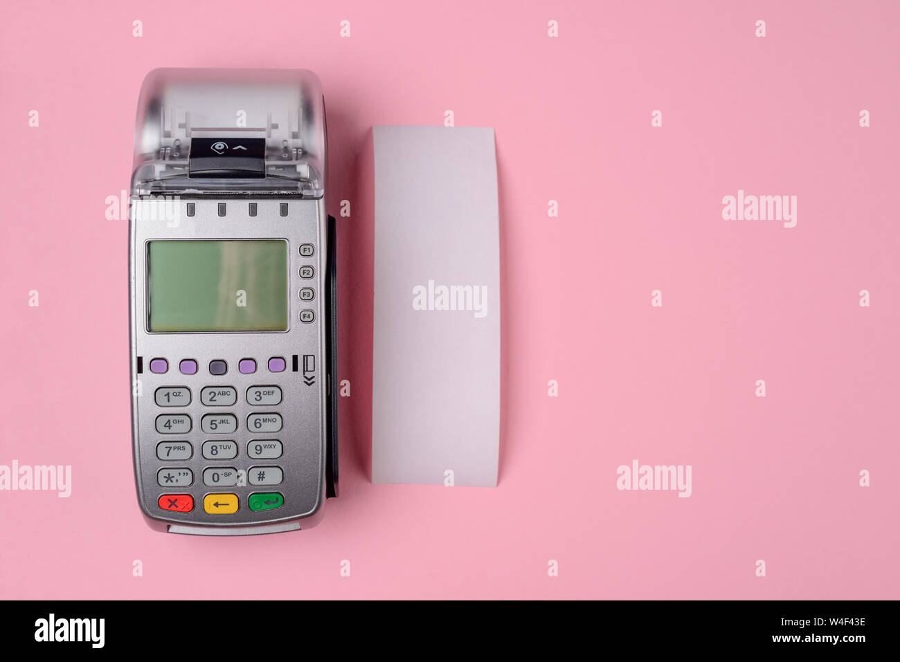 POS terminal and receipt Stock Photo - Alamy